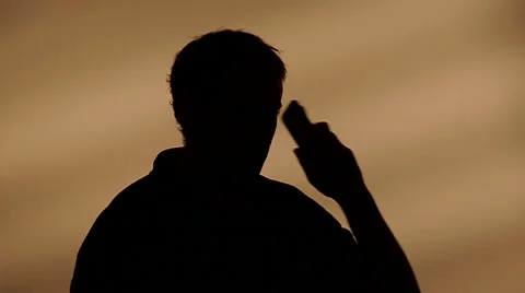 Silhouette Phone Stock Footage ~ Royalty Free Stock Videos | Pond5