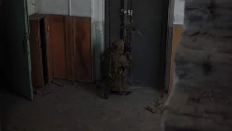 A male stalker breaks open a door in an ... | Stock Video | Pond5