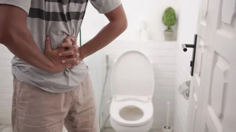 male with stomach ache having a diarrhea... | Stock Video | Pond5