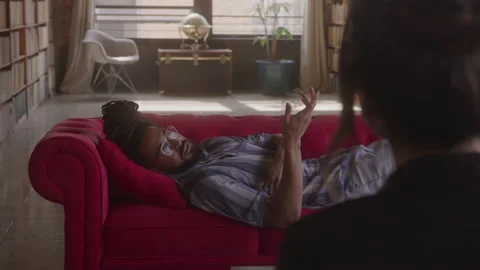 Male Student with Glasses Laying Down on... | Stock Video | Pond5