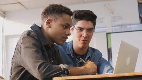 Male Teacher Giving One To One Support T... | Stock Video | Pond5