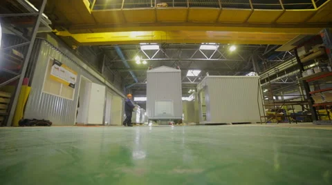 Male worker moving container in a huge w... | Stock Video | Pond5