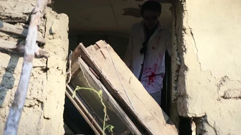 Male Zombie scene, ruined area countrysi... | Stock Video | Pond5