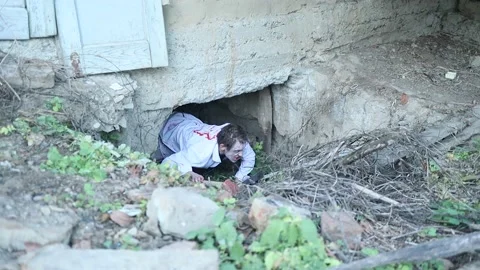 Male Zombie scene, ruined area countrysi... | Stock Video | Pond5