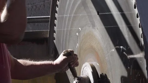 man adjusting the cutting disc, saw, for... | Stock Video | Pond5