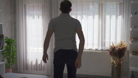 Man Walking Towards Window Stock Video Footage | Royalty Free Man ...