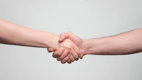 Man and woman shake hands, long handshak... | Stock Video | Pond5