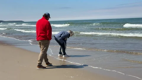 A man and a woman walk along the Baltic ... | Stock Video | Pond5