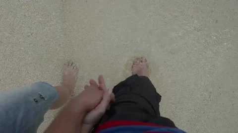 Man and woman's feet point of view while... | Stock Video | Pond5