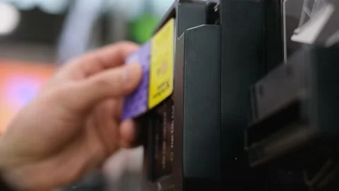 A man applying a bank card to the termin... | Stock Video | Pond5
