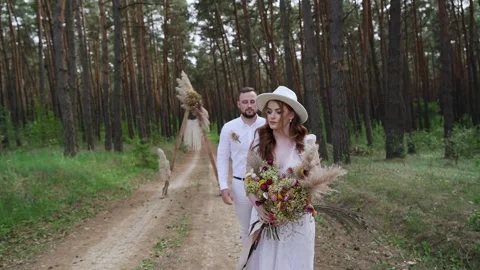 The man approaches the woman in the fore... | Stock Video | Pond5