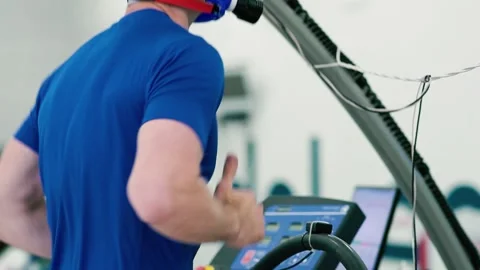 Man athlete going trough the Vo2 max tes... | Stock Video | Pond5