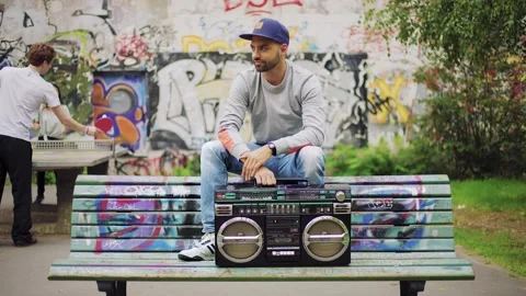 Man on Bench with Boombox (Cinemagraph) | Stock Video | Pond5