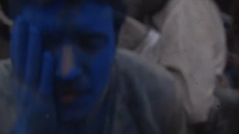 man with blue painted face dancing at th... | Stock Video | Pond5
