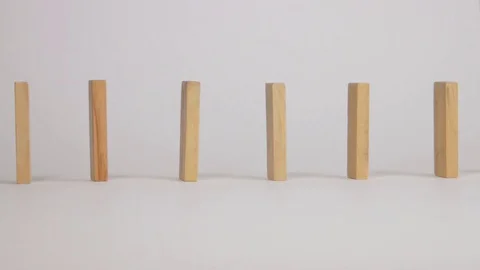 Man bumping Jenga blocks in a row for a ... | Stock Video | Pond5