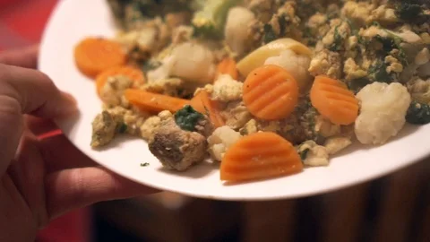 Man carrying hot food on plate. Shallow ... | Stock Video | Pond5