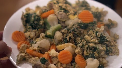 Man carrying hot food on plate. Shallow ... | Stock Video | Pond5