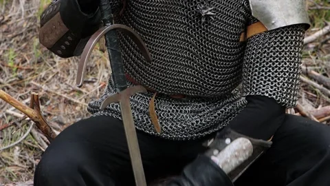 man in chainmail with gray hair and a sc... | Stock Video | Pond5