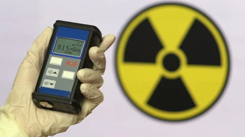 Man checking radiation with geiger count... | Stock Video | Pond5