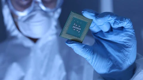 Man in clean room holds up computer cpu ... | Stock Video | Pond5