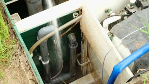 The man is cleaning septic. Maintenance ... | Stock Video | Pond5