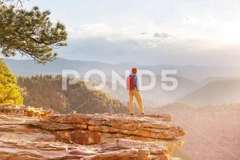 Man on the cliff Man on the sheer cliff ,model released, Symbolfoto ...