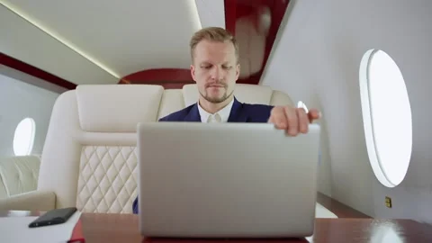 Man closing laptop and looking at camera... | Stock Video | Pond5