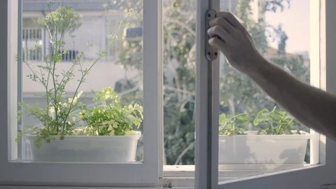 Hand Closing Window Stock Footage ~ Royalty Free Stock Videos | Pond5