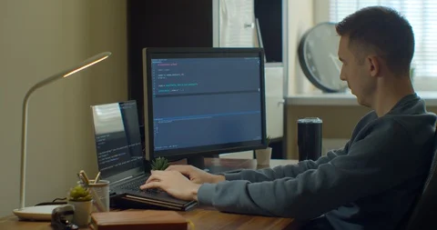 Man coding html and programming on scree... | Stock Video | Pond5