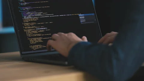 Man coding on laptop | Stock Video | Pond5