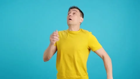 Man with a cold sneezes five times in a ... | Stock Video | Pond5