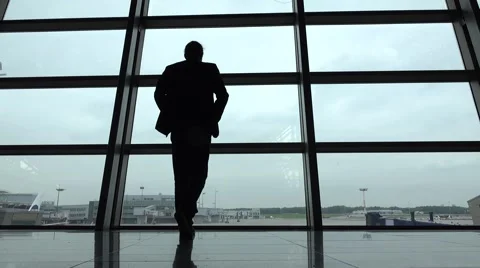 Man come and stand at full height, gaze ... | Stock Video | Pond5