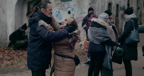 Man Consoling Immigrant Woman Crying Dur... | Stock Video | Pond5