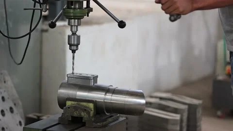 Man controlling a spline shaft on millin... | Stock Video | Pond5