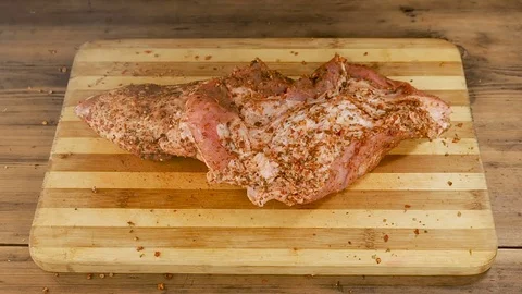 A man cooks meat on a cutting Board on t... | Stock Video | Pond5