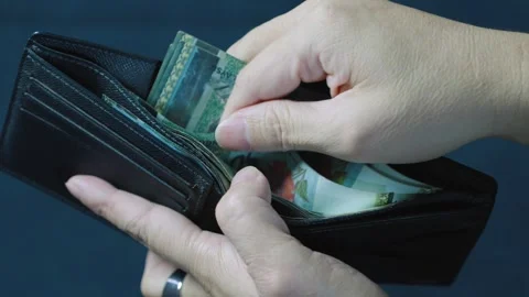 Man counting malaysian ringgit banknotes | Stock Video | Pond5