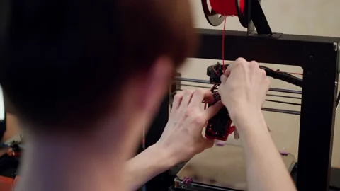 Man creating 3d model on printer | Stock Video | Pond5