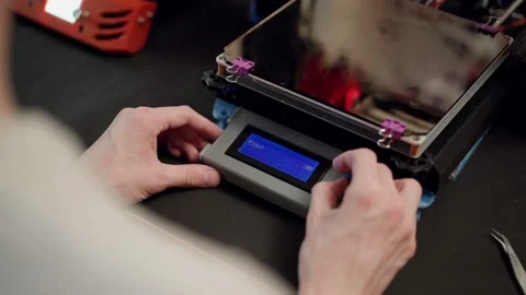 Man creating 3d model on printer | Stock Video | Pond5