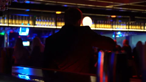 Man dancing alone at bar counter and dri... | Stock Video | Pond5