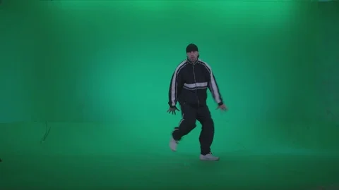 man dancing break dance on green screen | Stock Video | Pond5