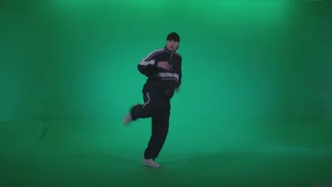 man dancing break dance on green screen | Stock Video | Pond5