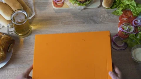 Man with delight looking at big fatty an... | Stock Video | Pond5