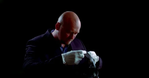 man is demonstrating how to wear full fa... | Stock Video | Pond5