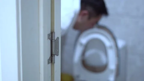 A man with diarrhea and vomiting in the ... | Stock Video | Pond5