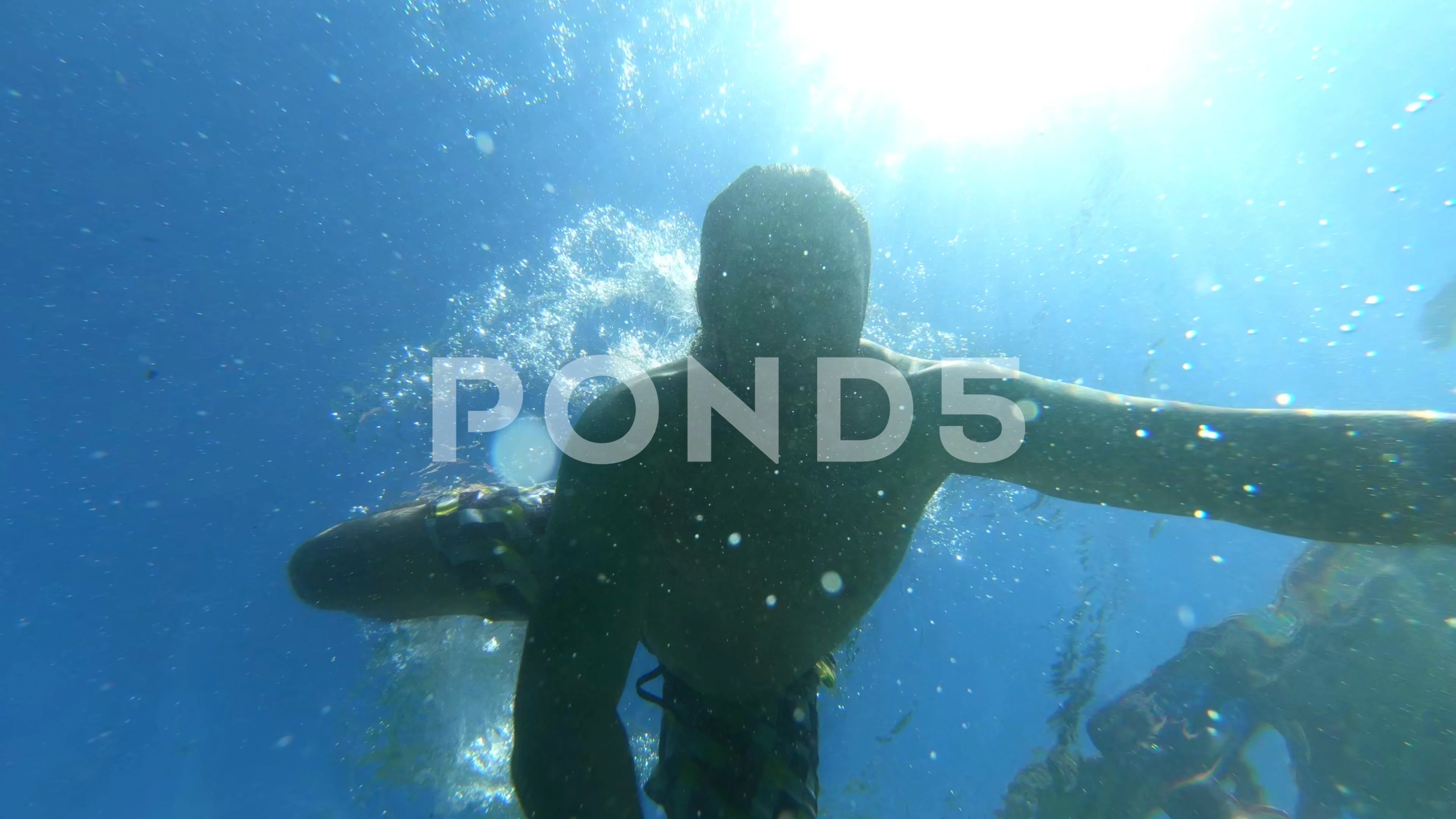 Person Diving Underwater