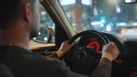 Man driving car through the streets of n... | Stock Video | Pond5