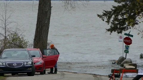 Man exiting car parked near scene of maj... | Stock Video | Pond5