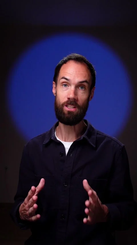 Man Explaining with Hand Gestures Agains... | Stock Video | Pond5