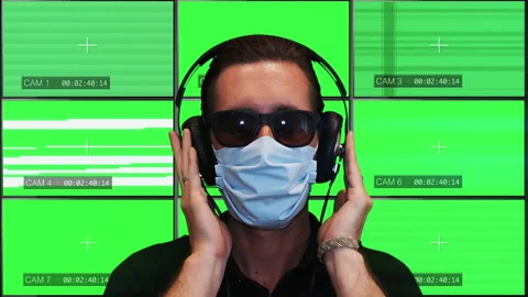 Man With Face Mask Over Green Screen Mon... | Stock Video | Pond5