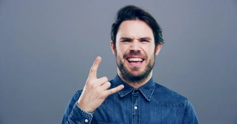 Man, face or excited with rock gesture f... | Stock Video | Pond5